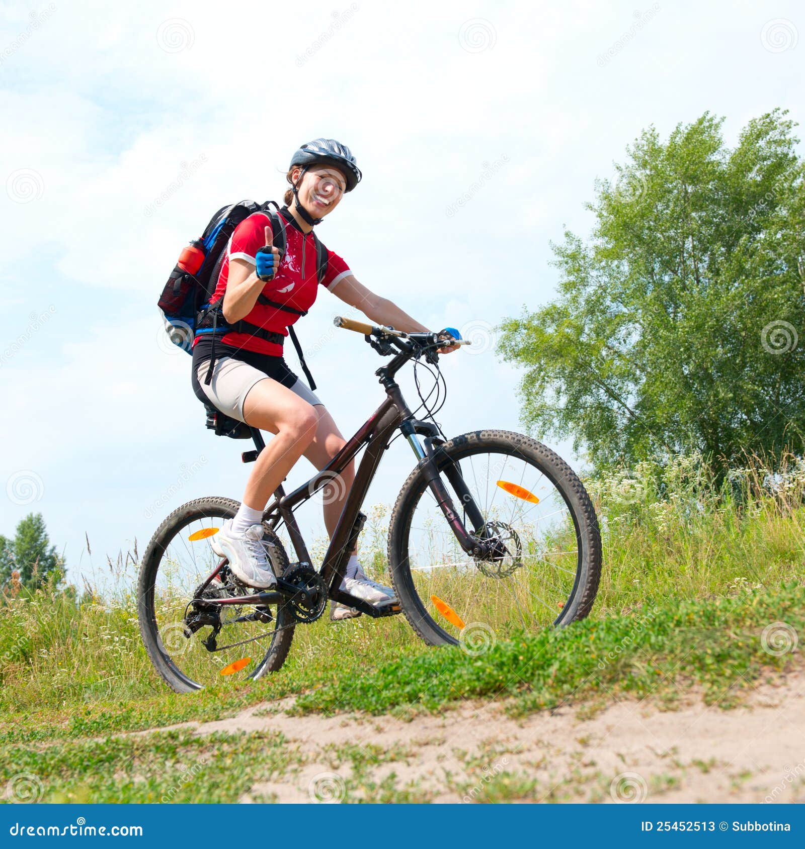 Young Woman riding bicycle stock image. Image of adult - 25452513