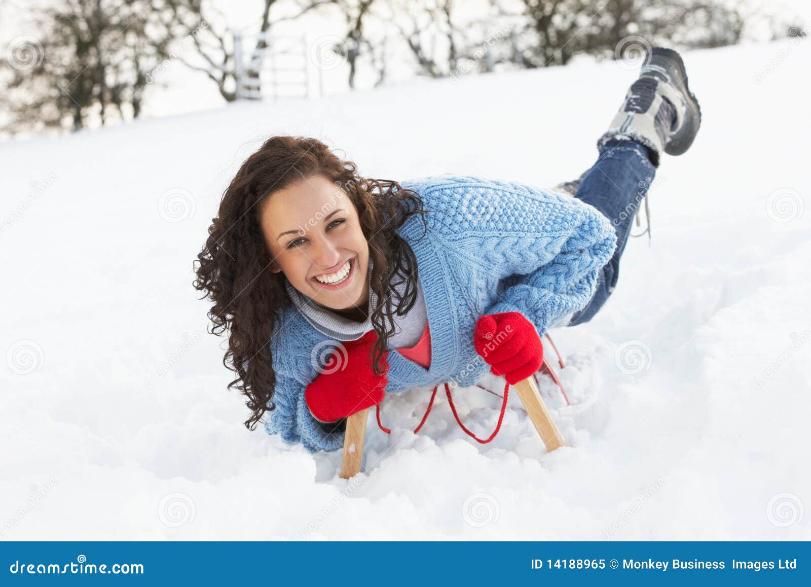 Young Woman Riding on Sledge in Snowy Landscape Stock Image - Image of ...