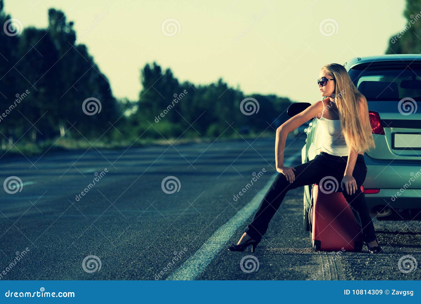 Young woman on the road stock image. Image of driver - 10814309