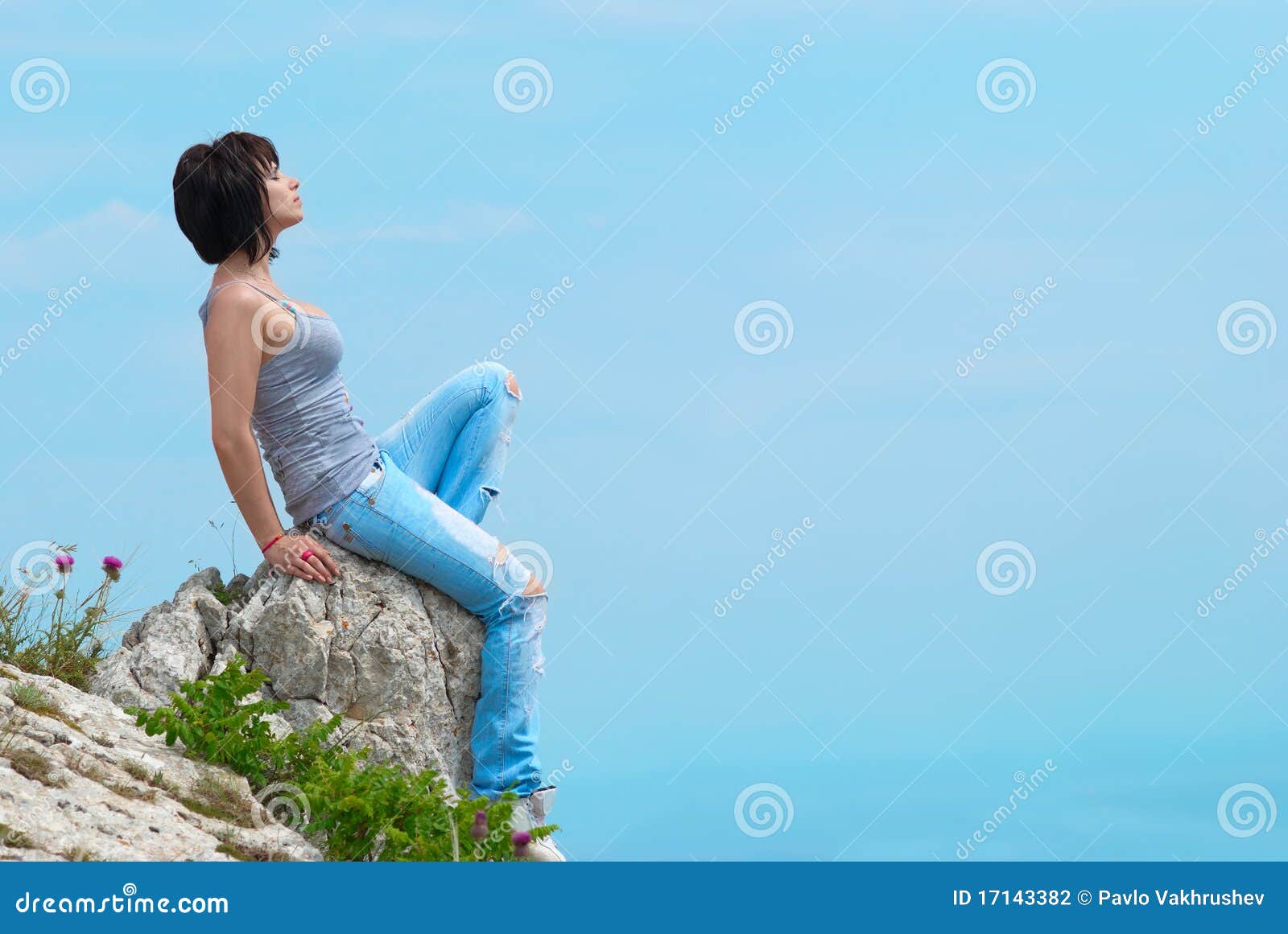 Young woman on the rock stock photo. Image of grass, mountain - 17143382