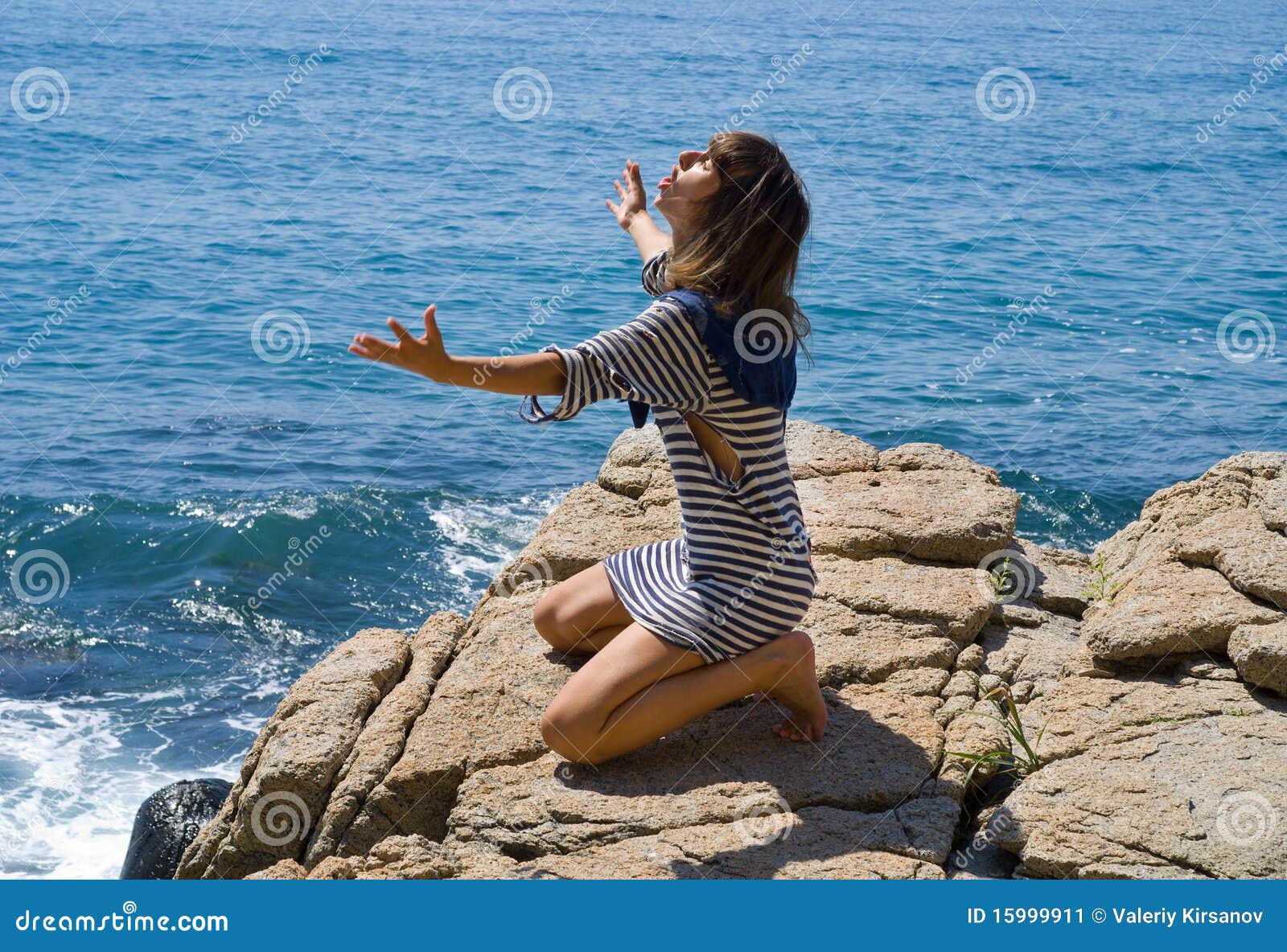 Young woman on rock 2 stock image. Image of beautiful - 15999911