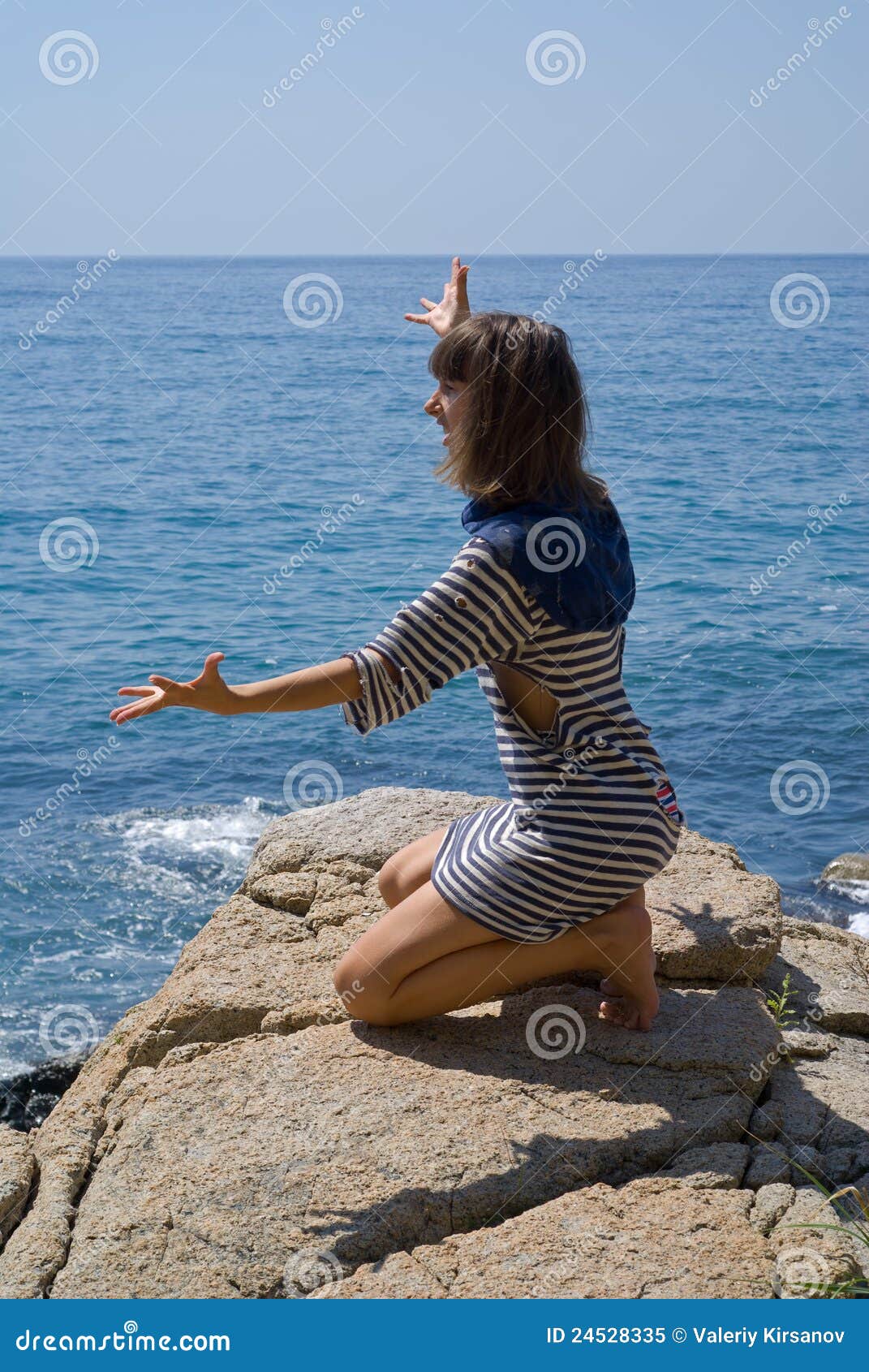 Young woman on rock 6 stock image. Image of seacoast - 24528335