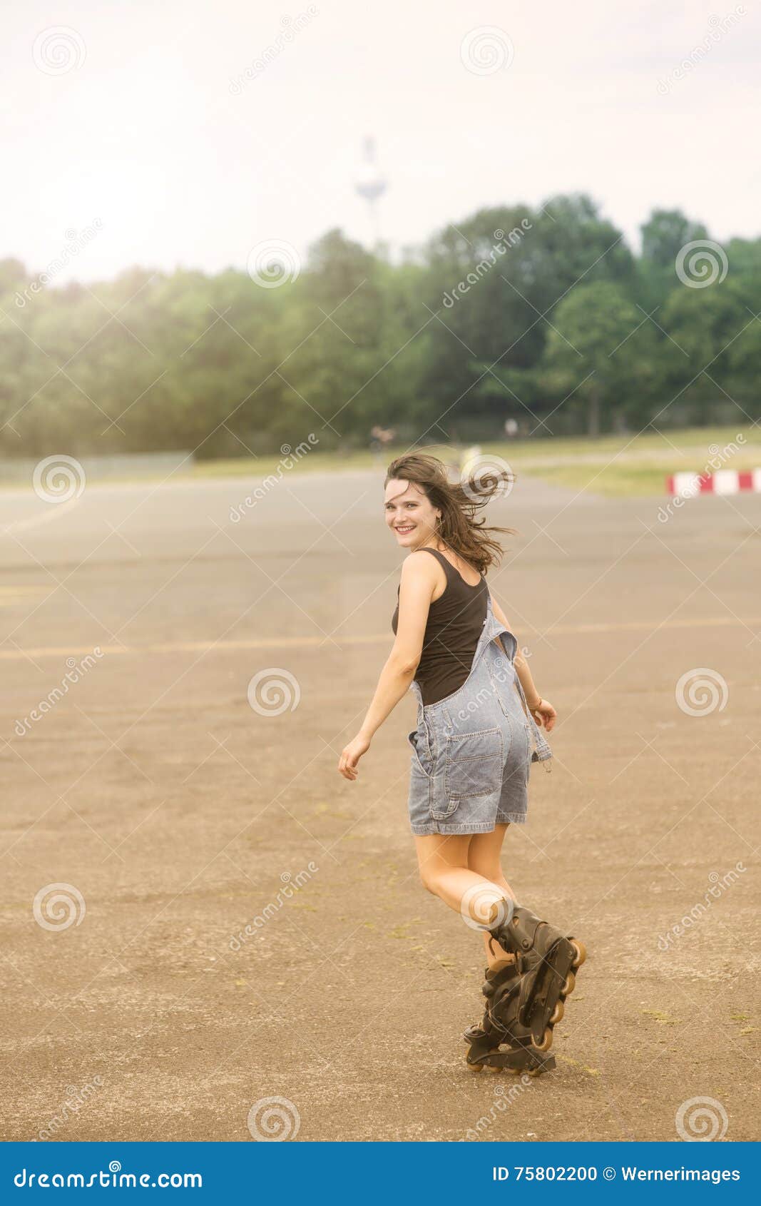Young Woman is Rollerblading on a Street Stock Photo - Image of female ...