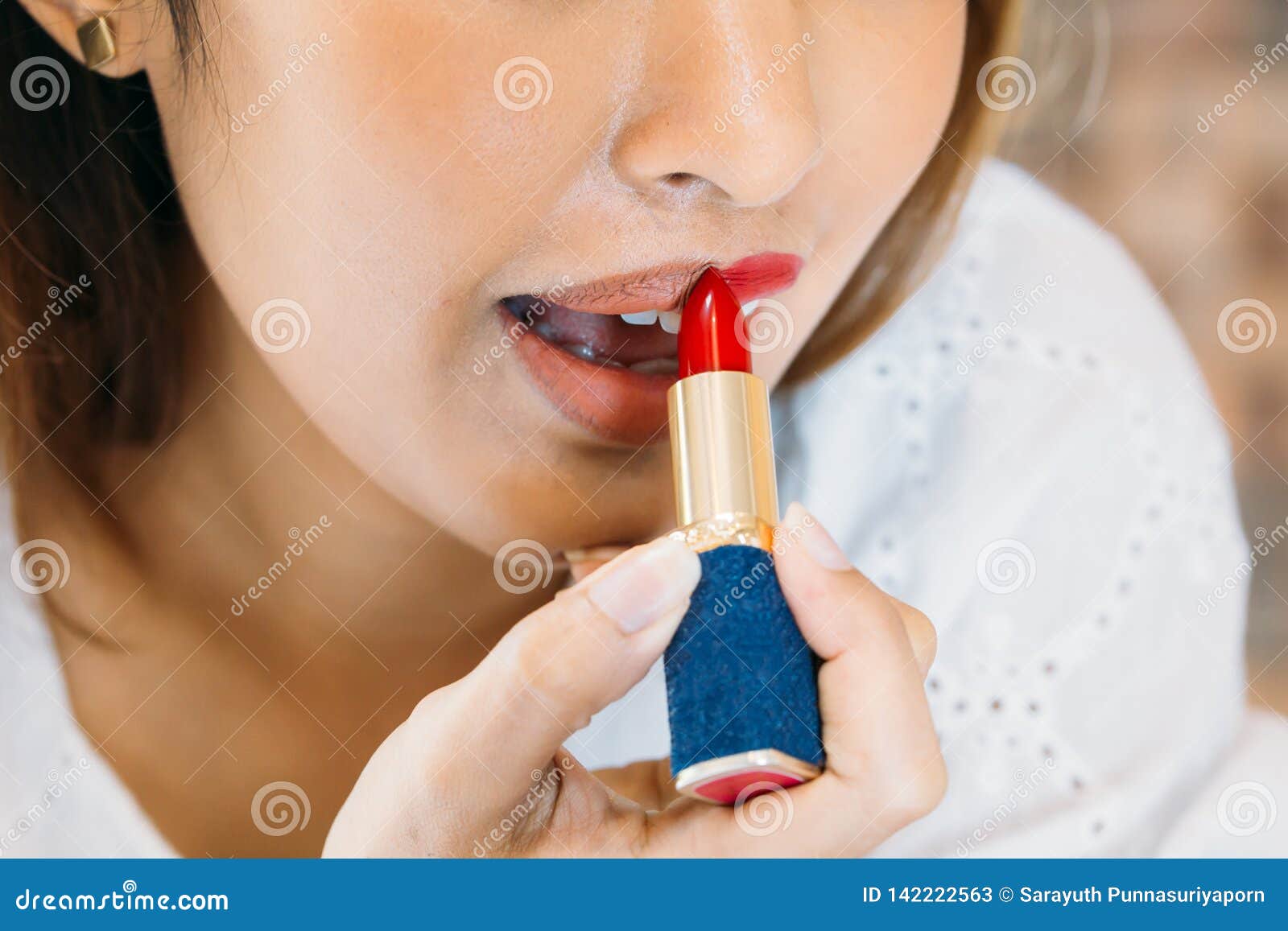 Young Woman Rouging Lips Stock Image Image Of Crop 142222563