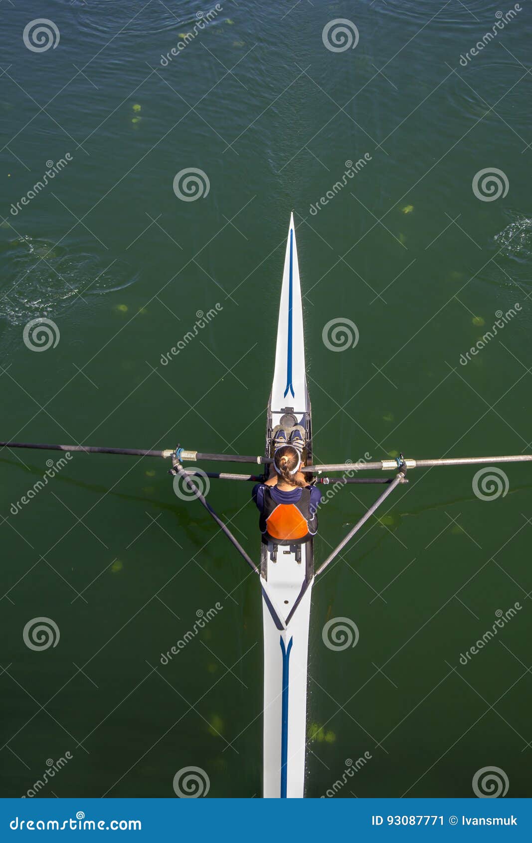 Young woman rowing in boat stock image. Image of crew - 93087771