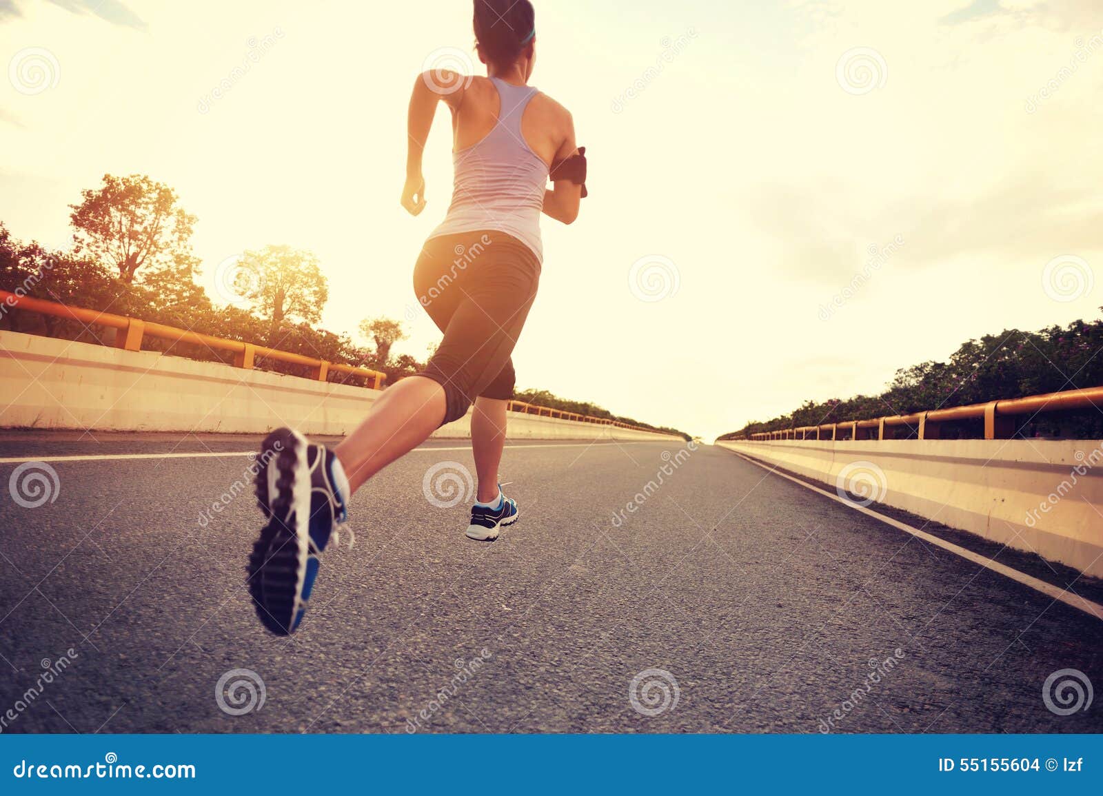 Young woman runner running stock photo. Image of girl - 55155604