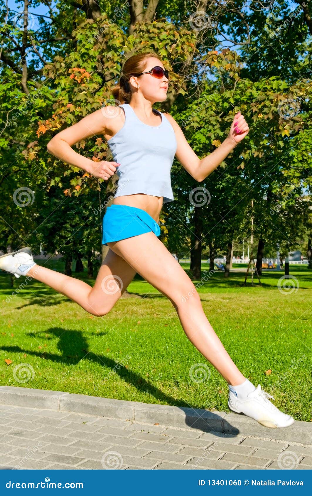 Young woman running stock photo. Image of outdoors, model - 13401060