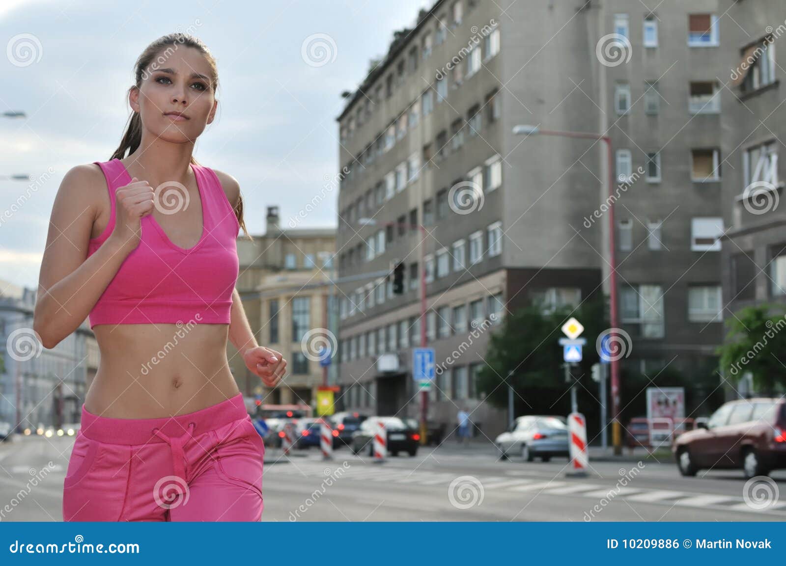 Young Woman Running in City Road Stock Photo - Image of health, person ...