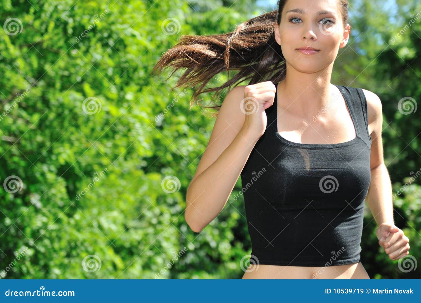 Young Woman Running in Green Park Stock Image - Image of running ...