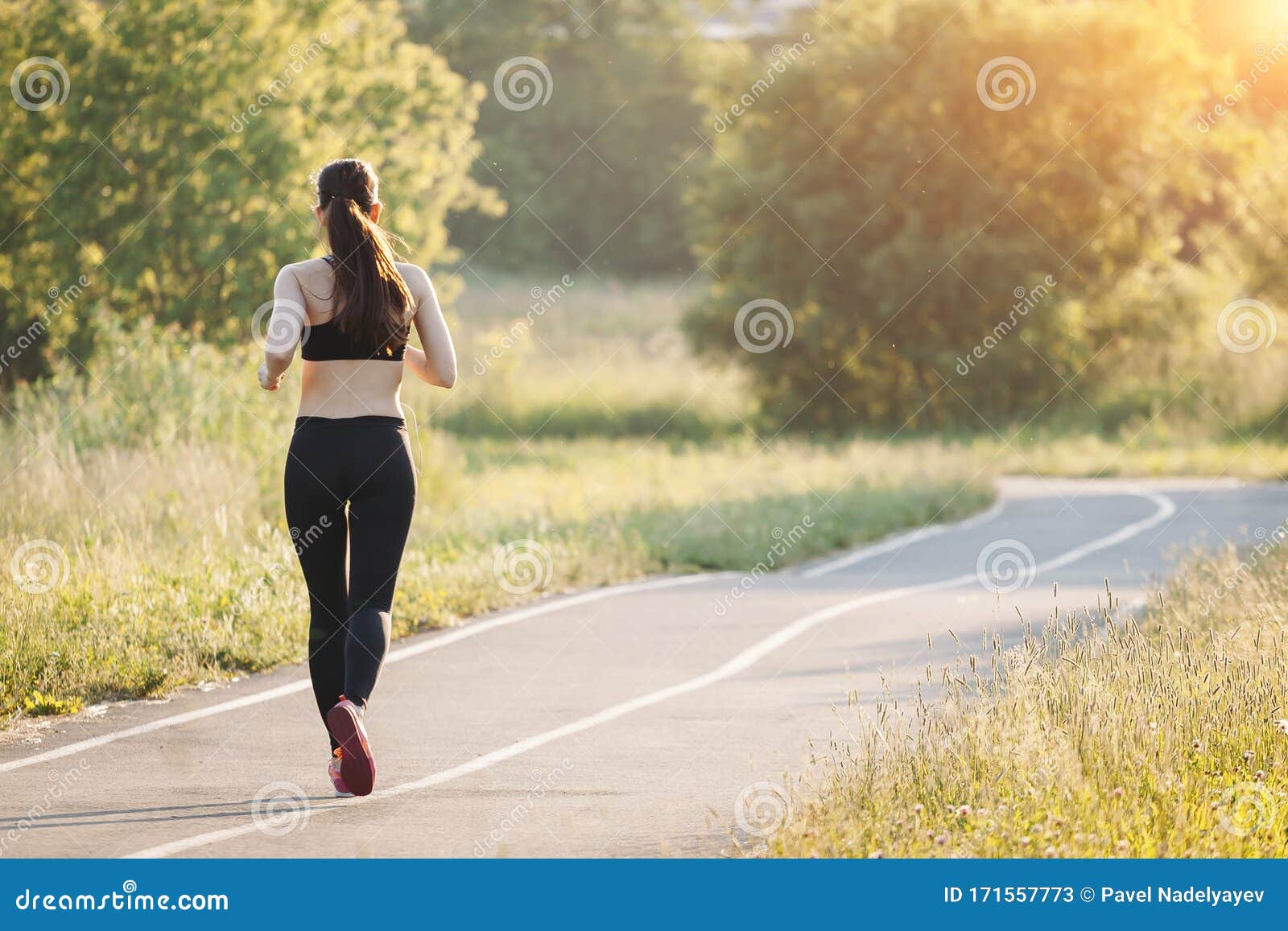 Young Woman Running in Park Stock Image - Image of park, nature: 171557773