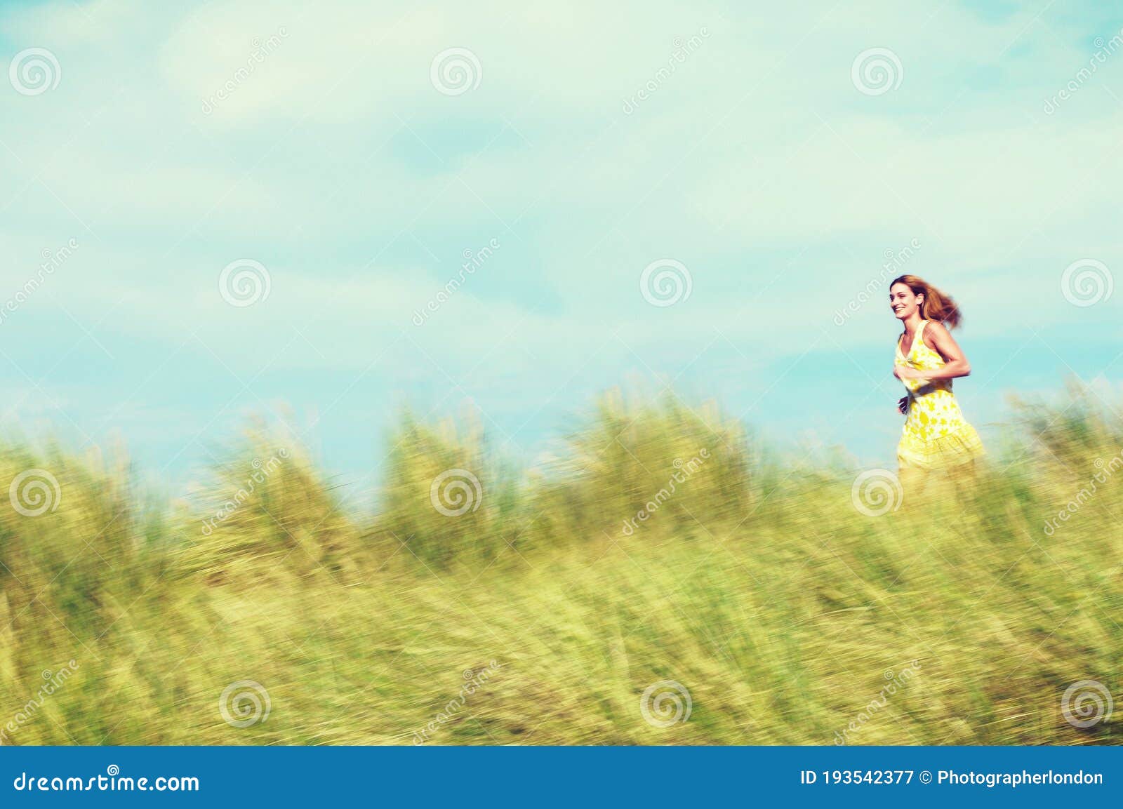 Young Woman Running through Tall Grass Stock Image - Image of child ...