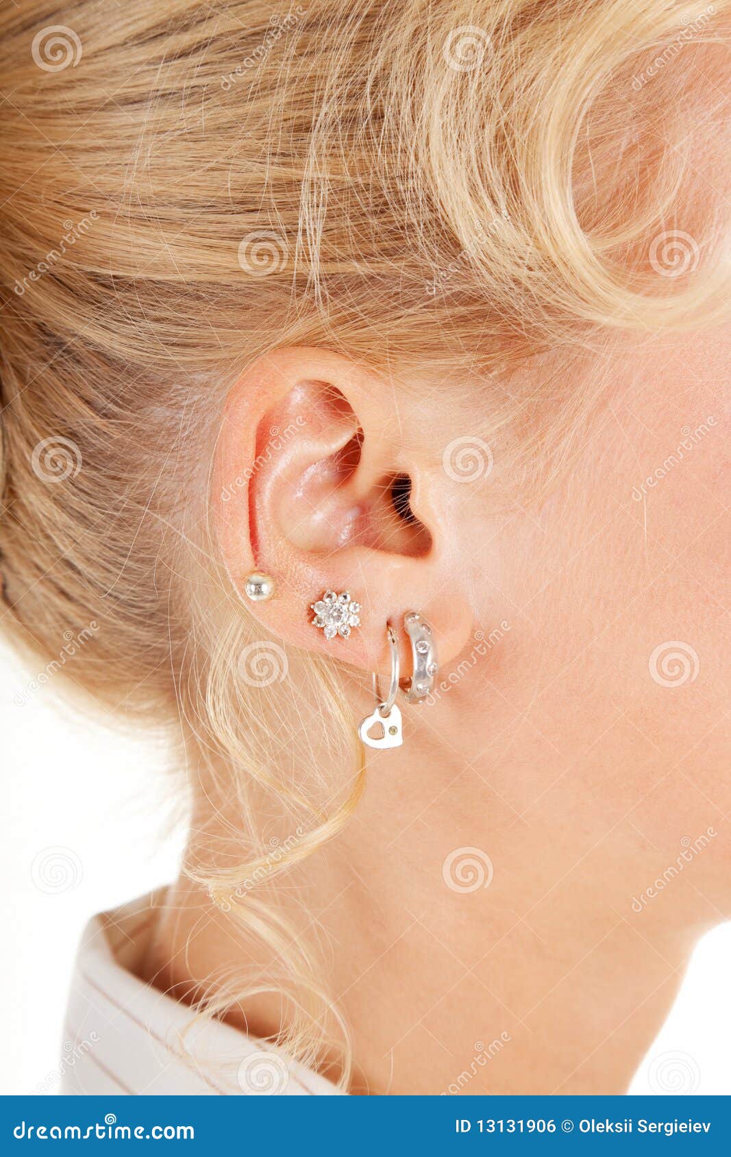 Young woman s ear stock photo. Image of gold, brilliant - 13131906