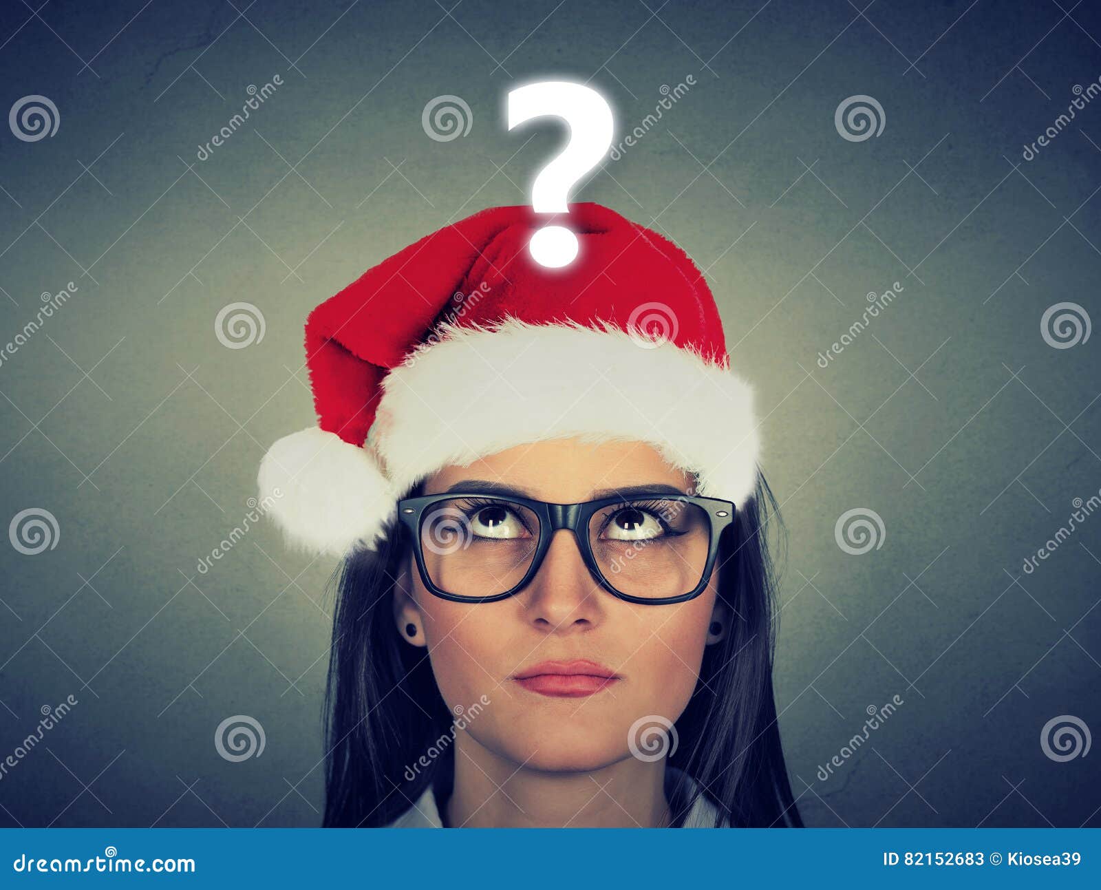Young Woman in Santa Claus Hat with Question Mark Stock Image - Image ...