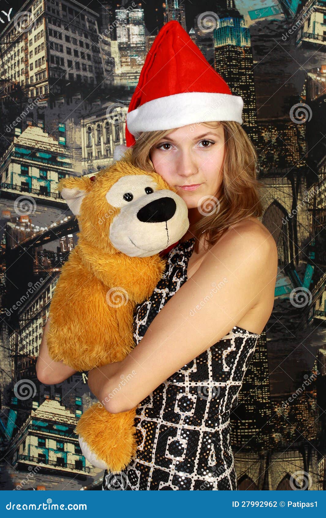 Young Woman in Santa Hat with Toy Stock Photo - Image of christmas ...