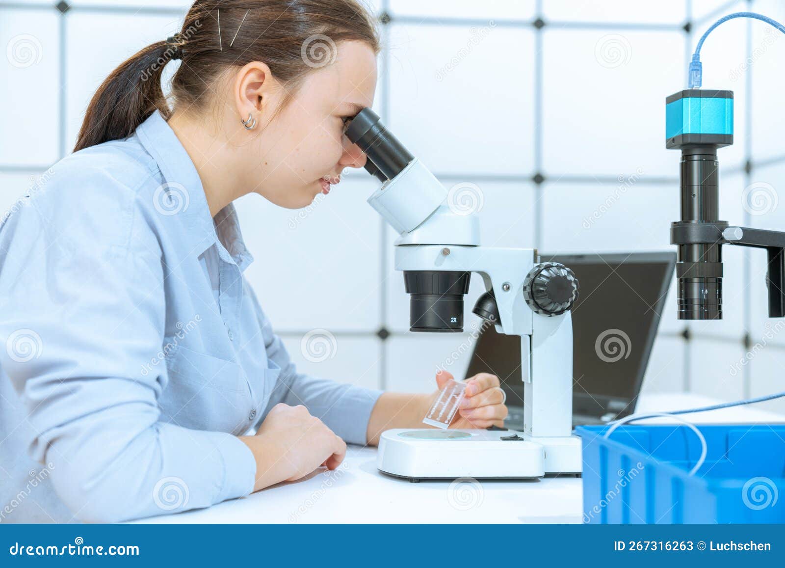 Young Woman in Science Lab Explore Lab on Chip Device Working with ...