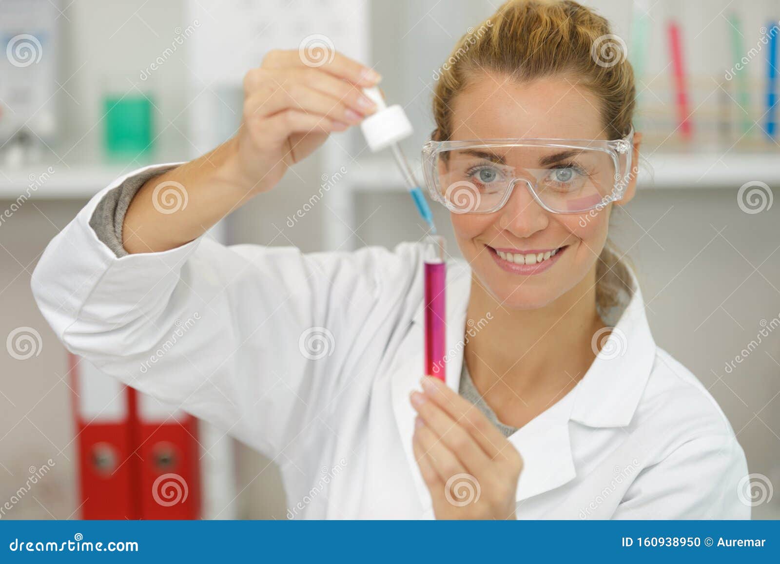 Young Woman in Scientific Lab with Test Tubes Stock Photo - Image of ...