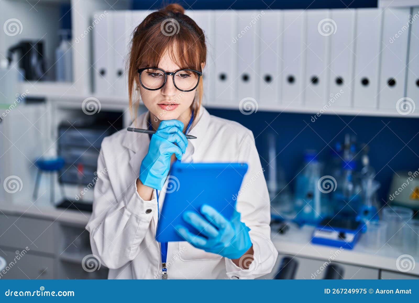 Young Woman Scientist Using Touchpad at Laboratory Stock Image - Image ...