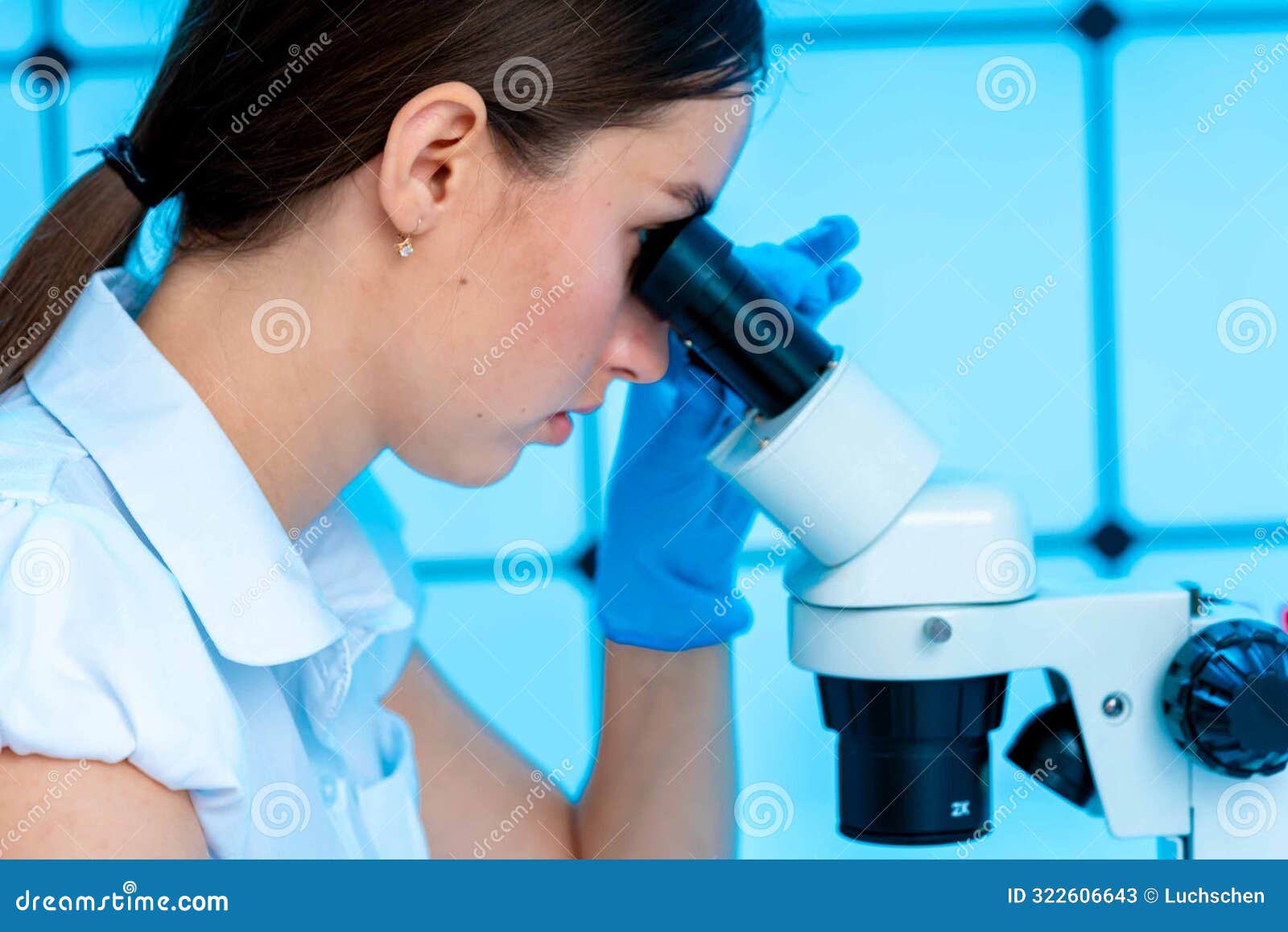 Young Woman Scientist Working with Microscope in Laboratory Stock Image ...