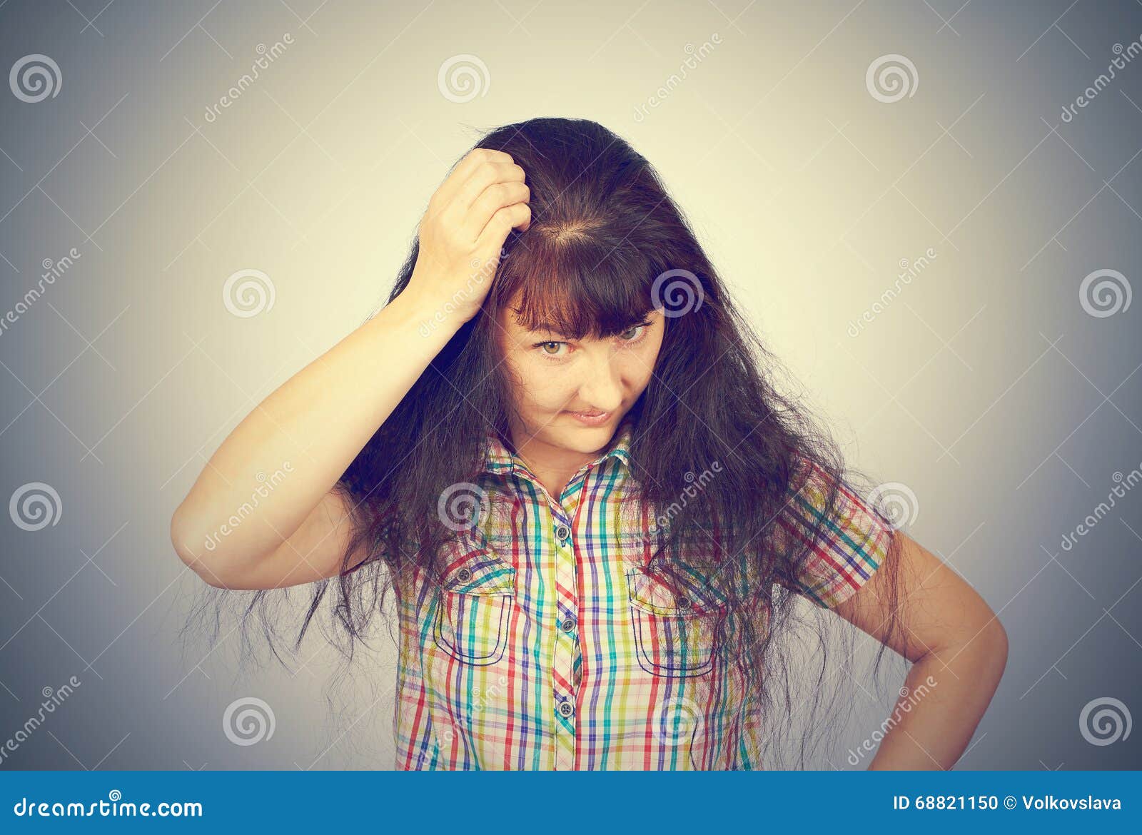 Young Woman Scratching Head, Thinking Daydreaming Deeply about Stock ...