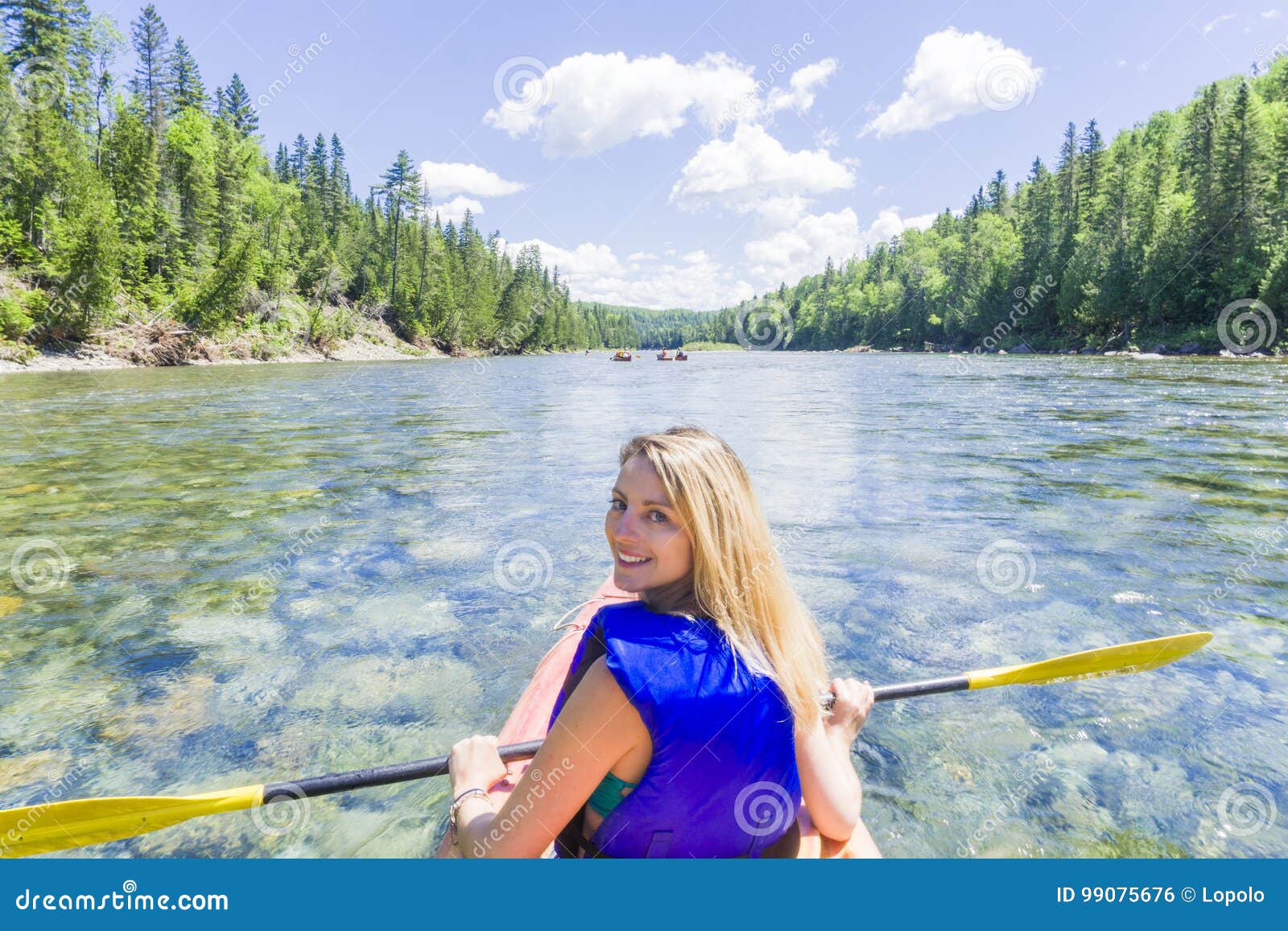 Young woman sea kayaking stock photo. Image of nautical - 99075676