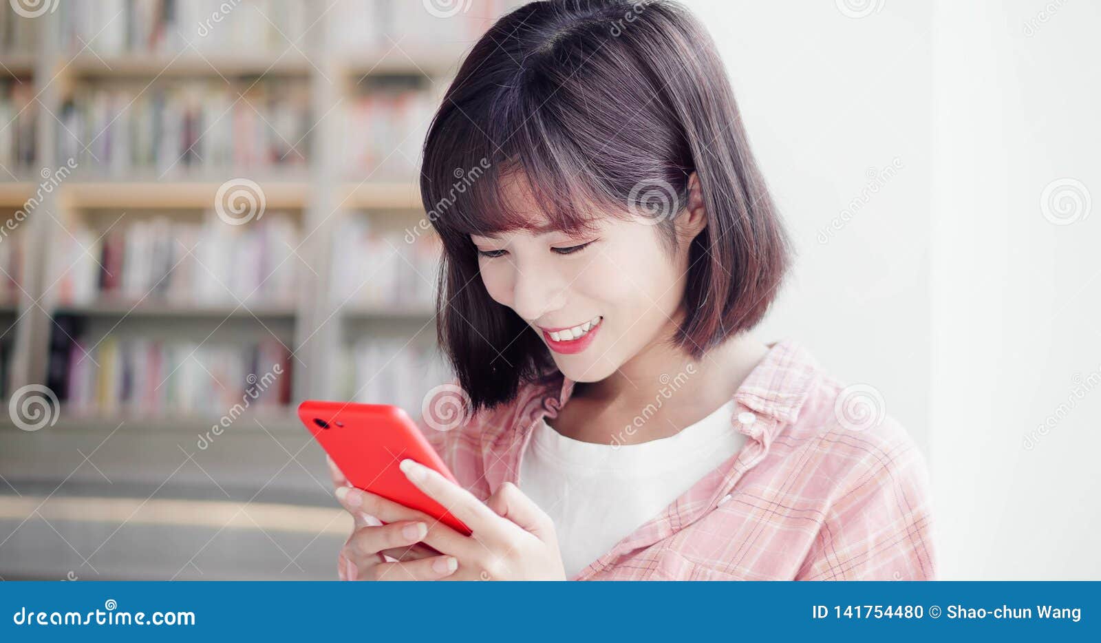 Young woman send message stock photo. Image of indoor - 141754480