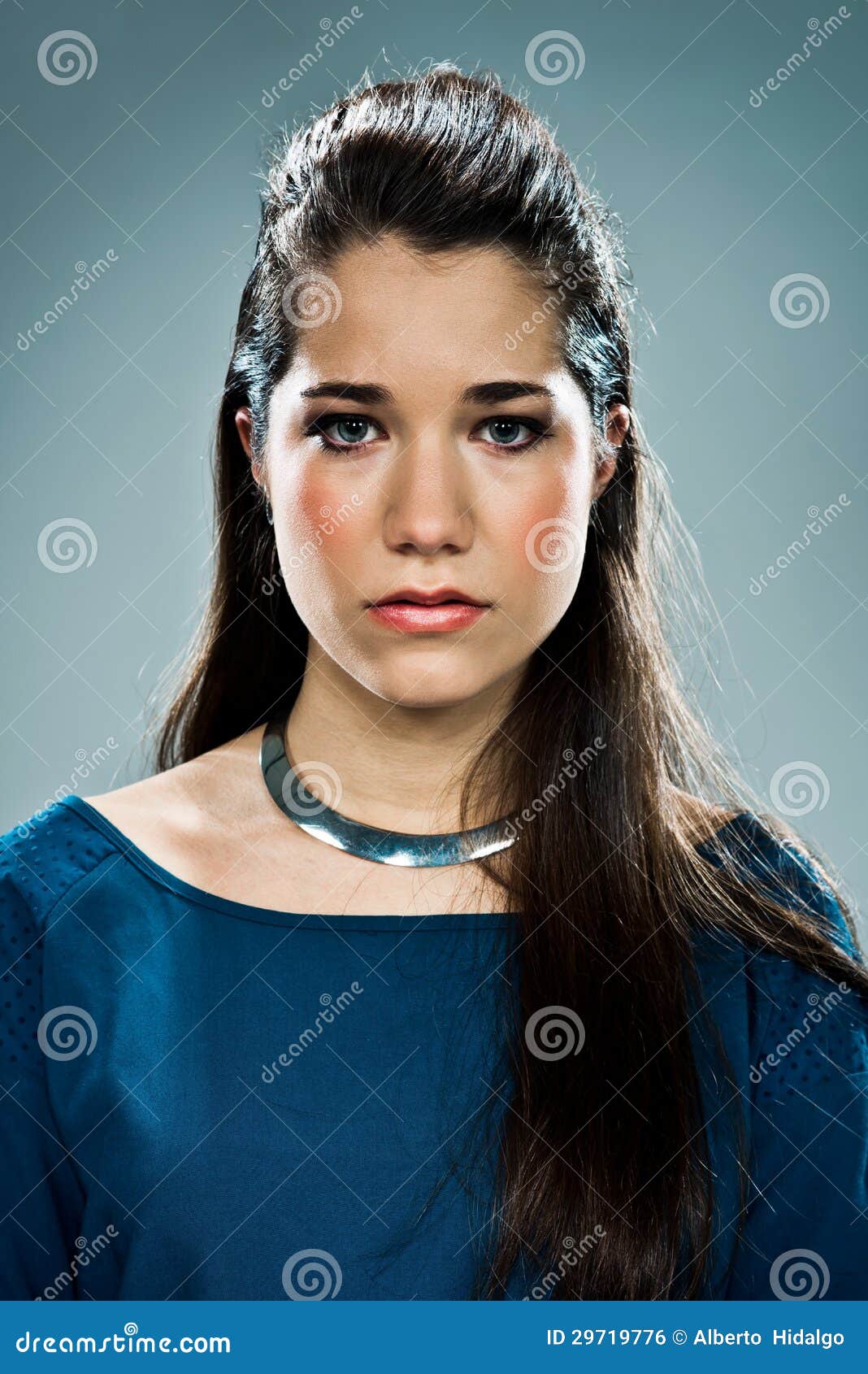 Young Woman with Serious Expression Stock Photo - Image of expression ...