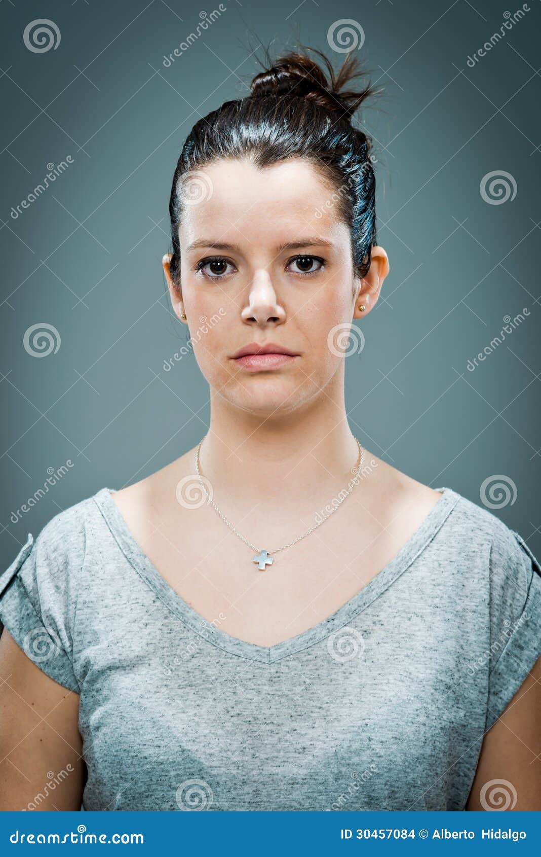Young Woman with Serious Expression Stock Photo - Image of hair, cool ...