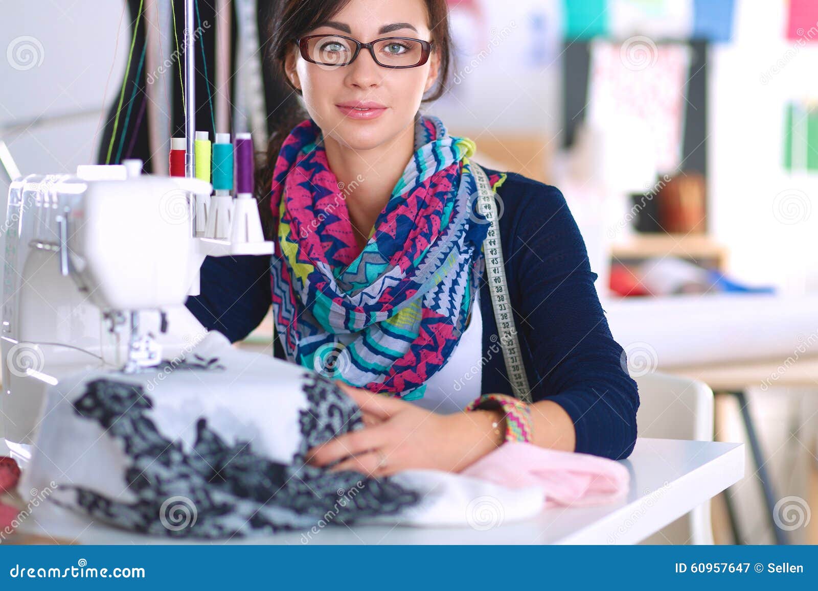 Young Woman Sewing while Sitting at Her Working Stock Image - Image of ...