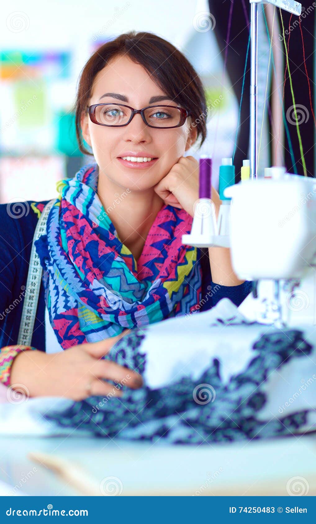 Young Woman Sewing while Sitting at Her Working Place Stock Image ...
