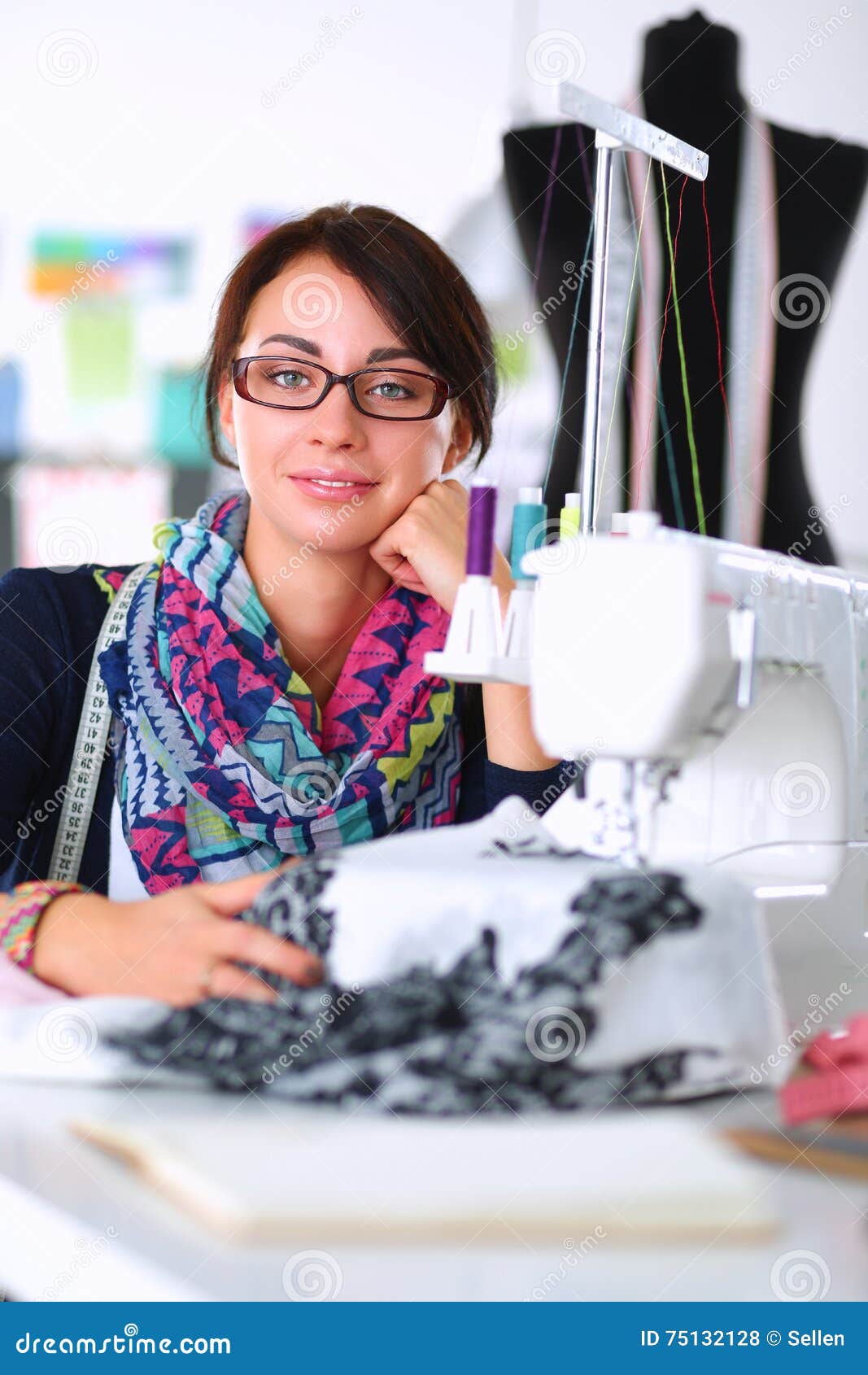 Young Woman Sewing while Sitting at Her Working Place Stock Photo ...