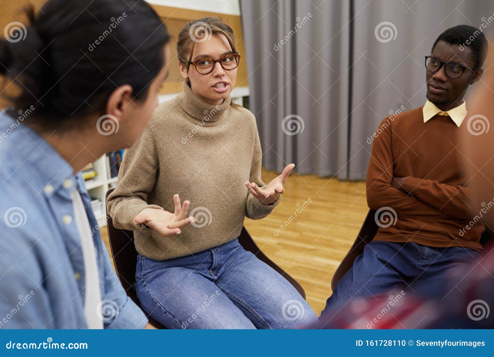 Young Woman Sharing in Support Group Stock Photo - Image of circle ...