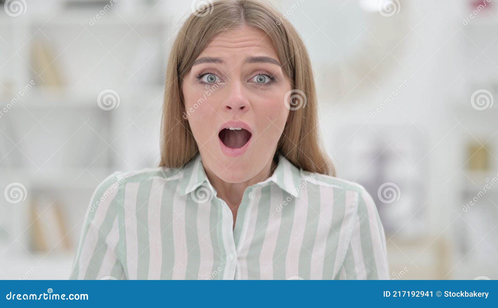 Portrait of Young Woman in Shock Looking at Camera Stock Image - Image ...