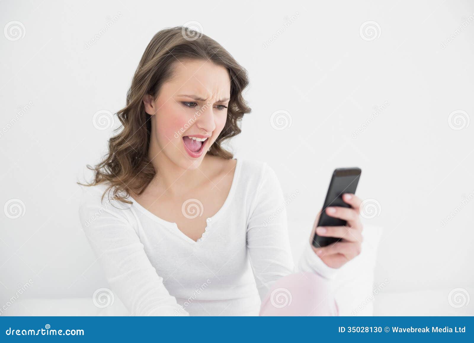 Young Woman Shouting into Mobile Phone Stock Photo - Image of open ...