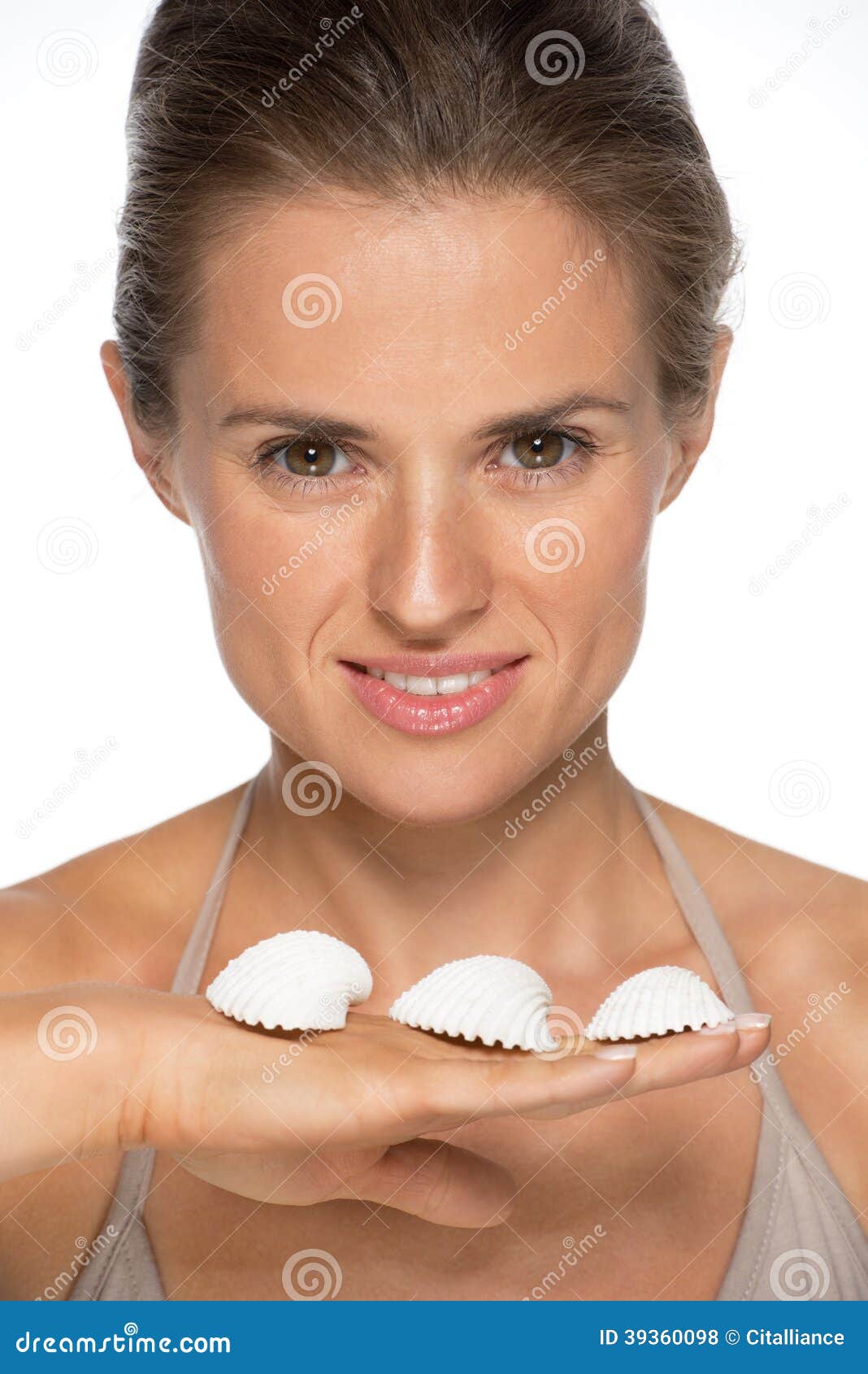 Young Woman Showing Seashells Stock Photo - Image of show, female: 39360098