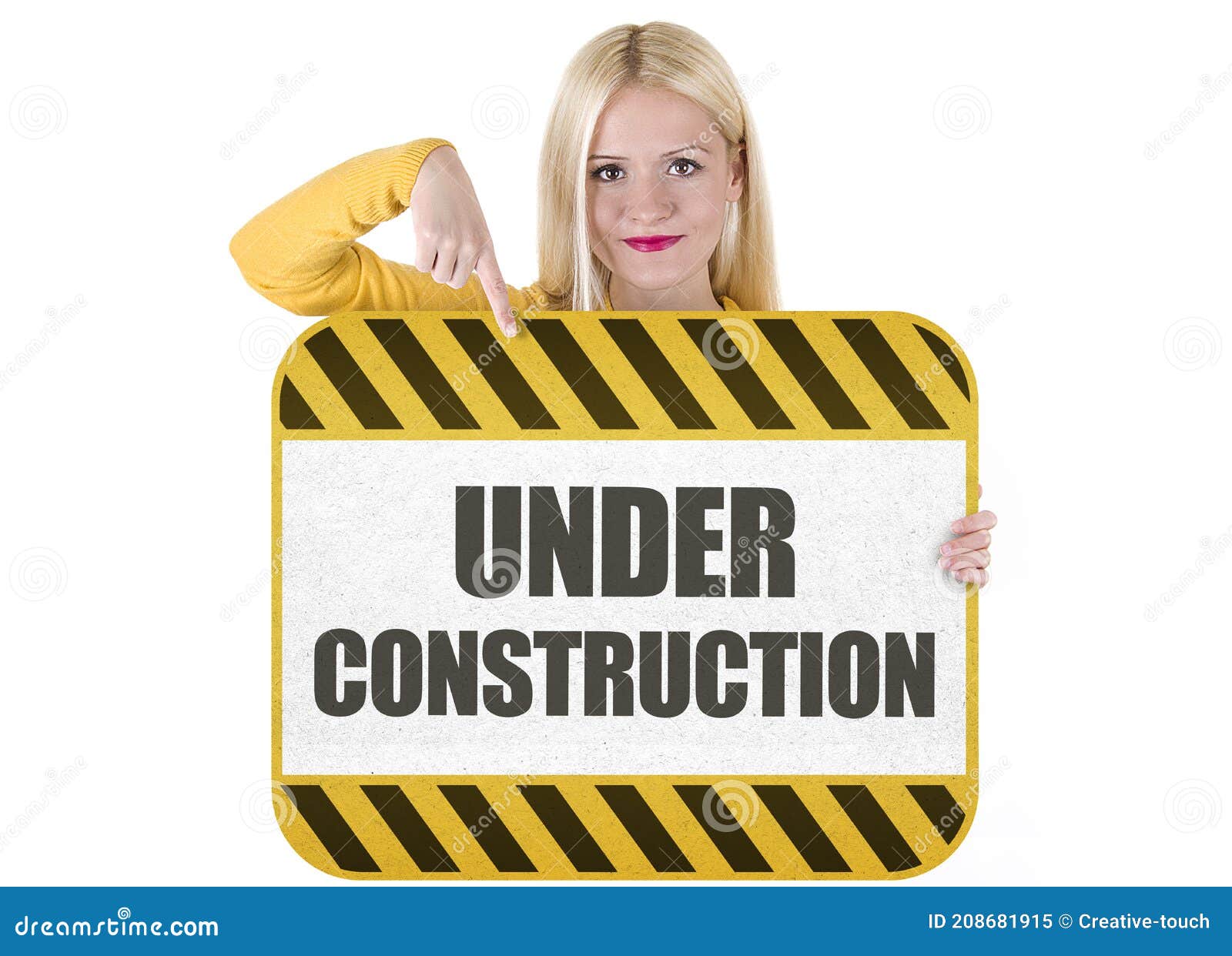Young Woman Showing Under Construction Banner Stock Image - Image of ...