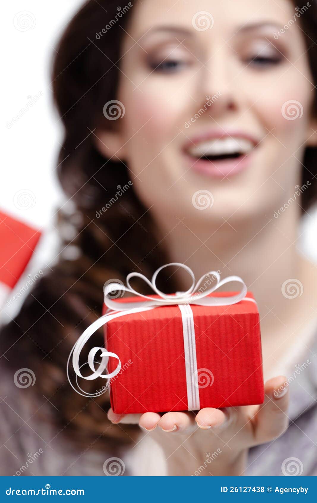 Young woman shows a gift stock photo. Image of give, birthday - 26127438