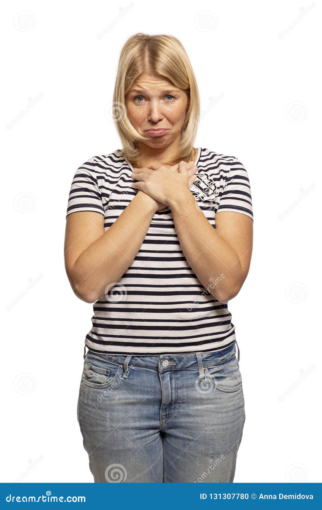 Young Woman in Shy Pose Isolated on White Background Stock Photo ...