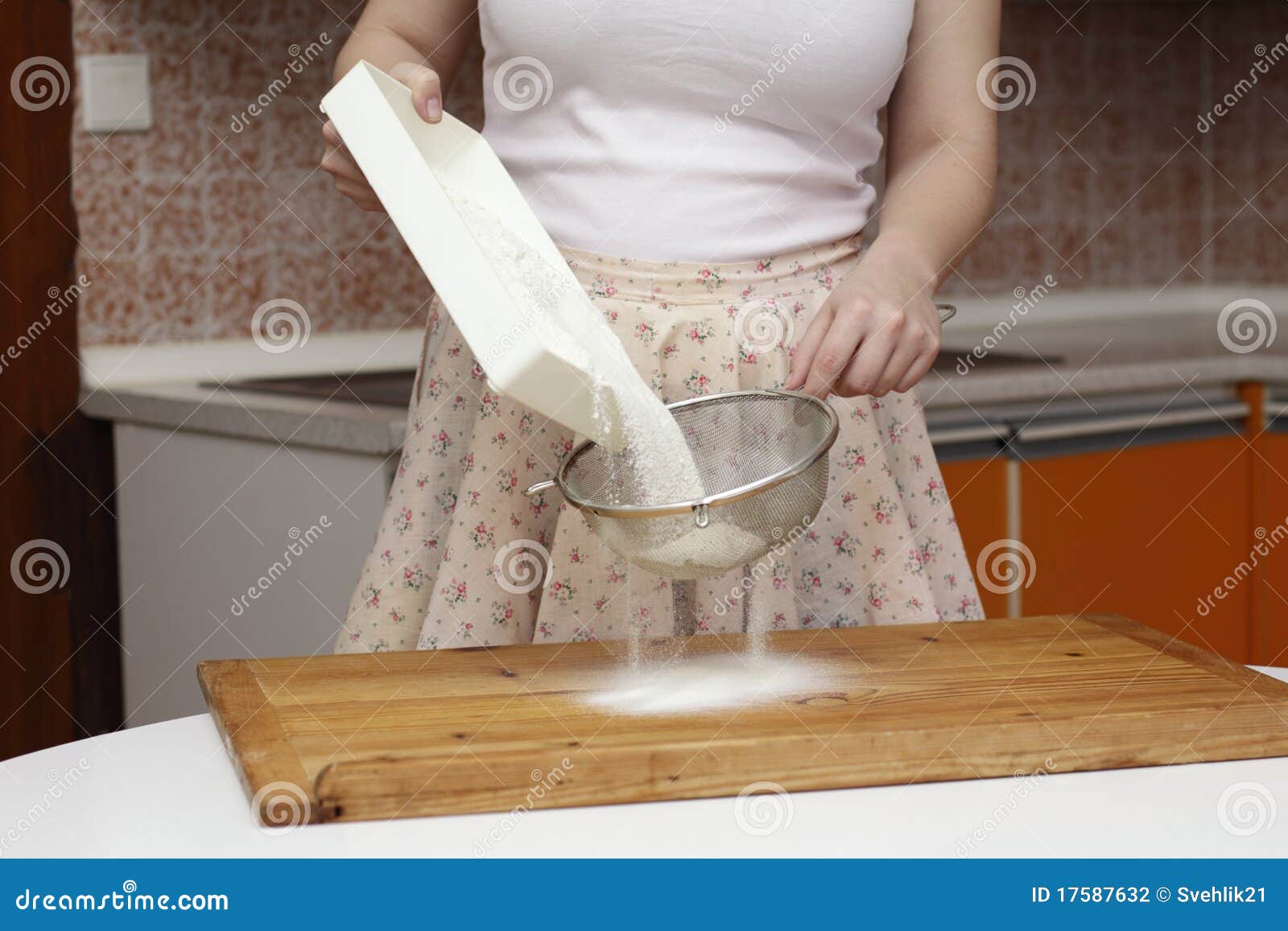 Young woman sifting flour stock photo. Image of horizontal - 17587632
