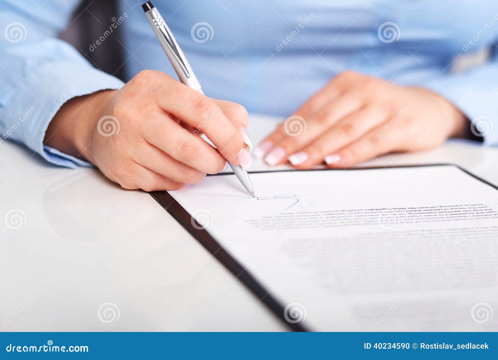 Young Woman Signs a Contract Stock Photo - Image of isolated, agreement ...