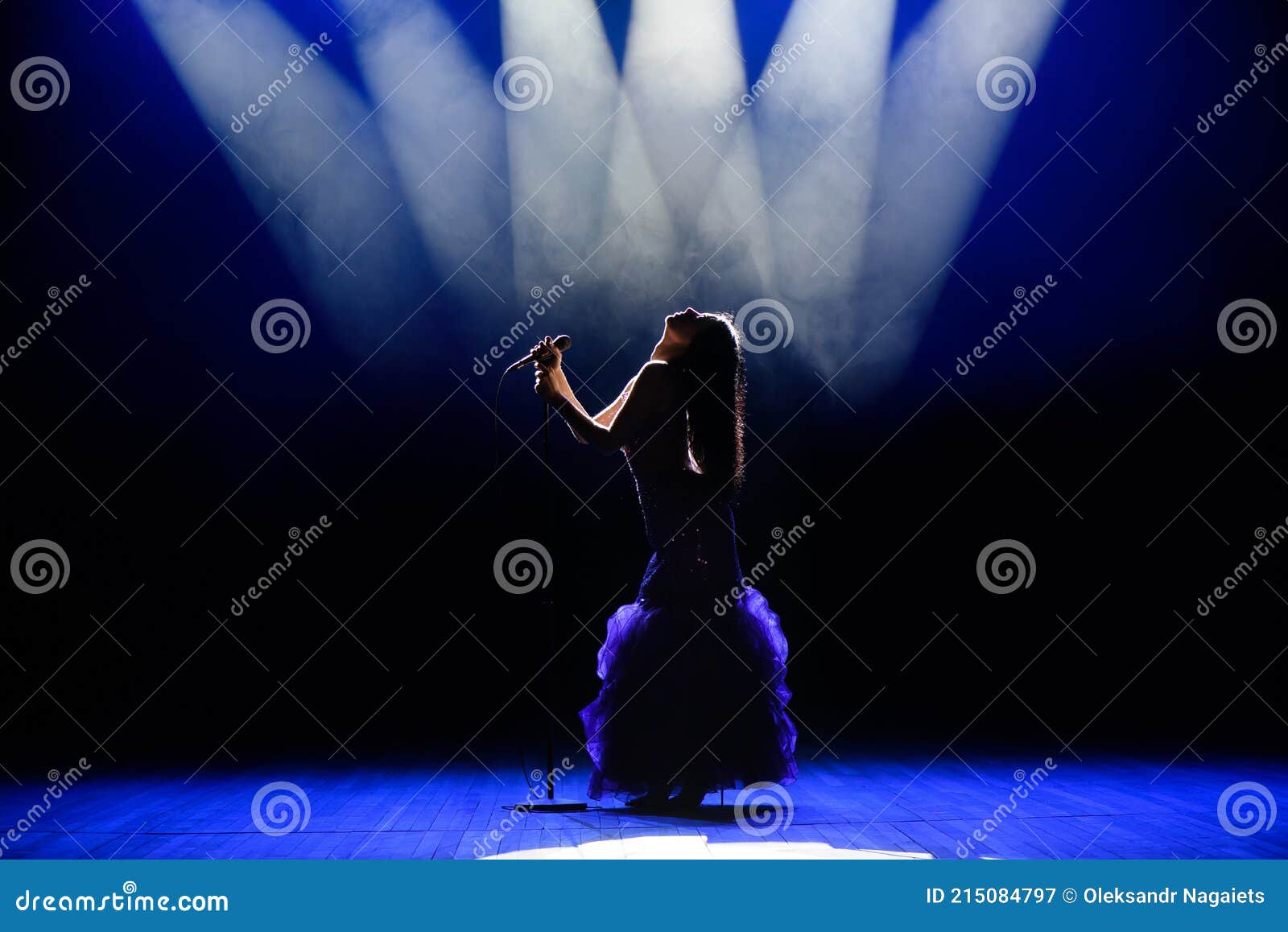 A Young Woman Singer on Stage during a Concert. Stock Image - Image of ...
