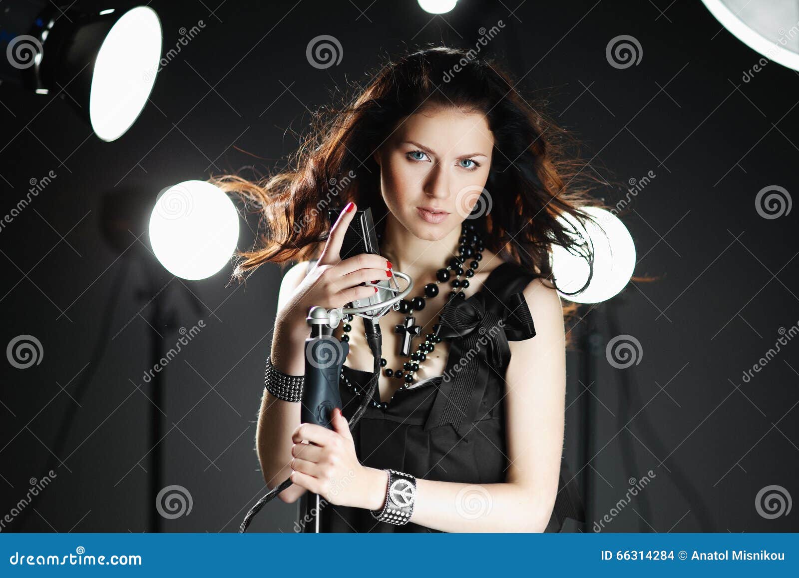 Young Woman Singing with Microphone Stock Photo - Image of performance ...