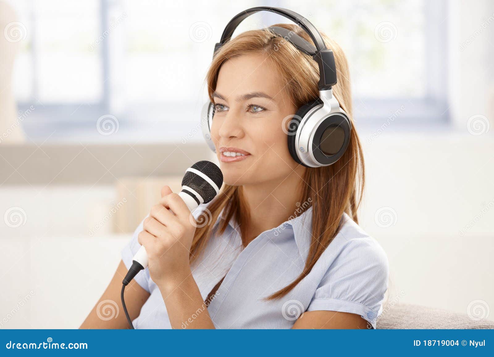 Young Woman Singing with Microphone Smiling Stock Photo - Image of ...