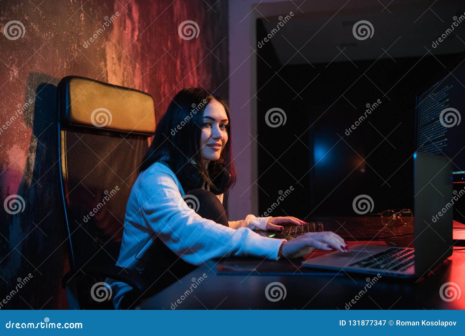 Young Woman Sit in Front of Personal Computer and Laptop, Php ... Young Woman Sit in Front of Personal Computer and Laptop, Php ...