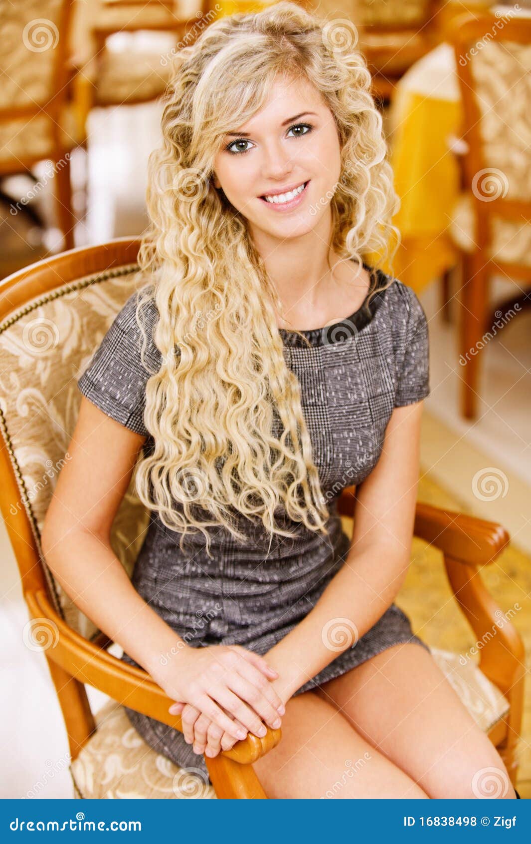 Young Woman Sits in Beautiful Stock Photo - Image of magnificent, home ...