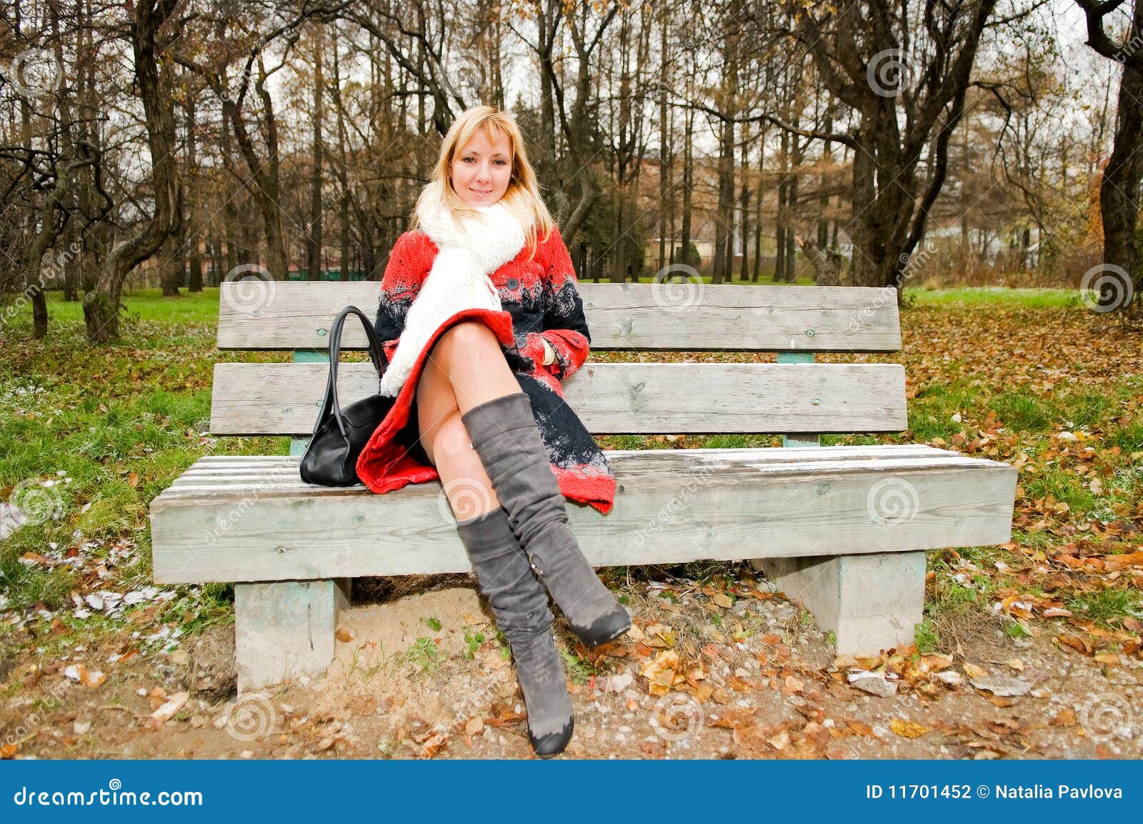 Young Woman Sitting on the Bench Stock Photo - Image of smile, hair ...