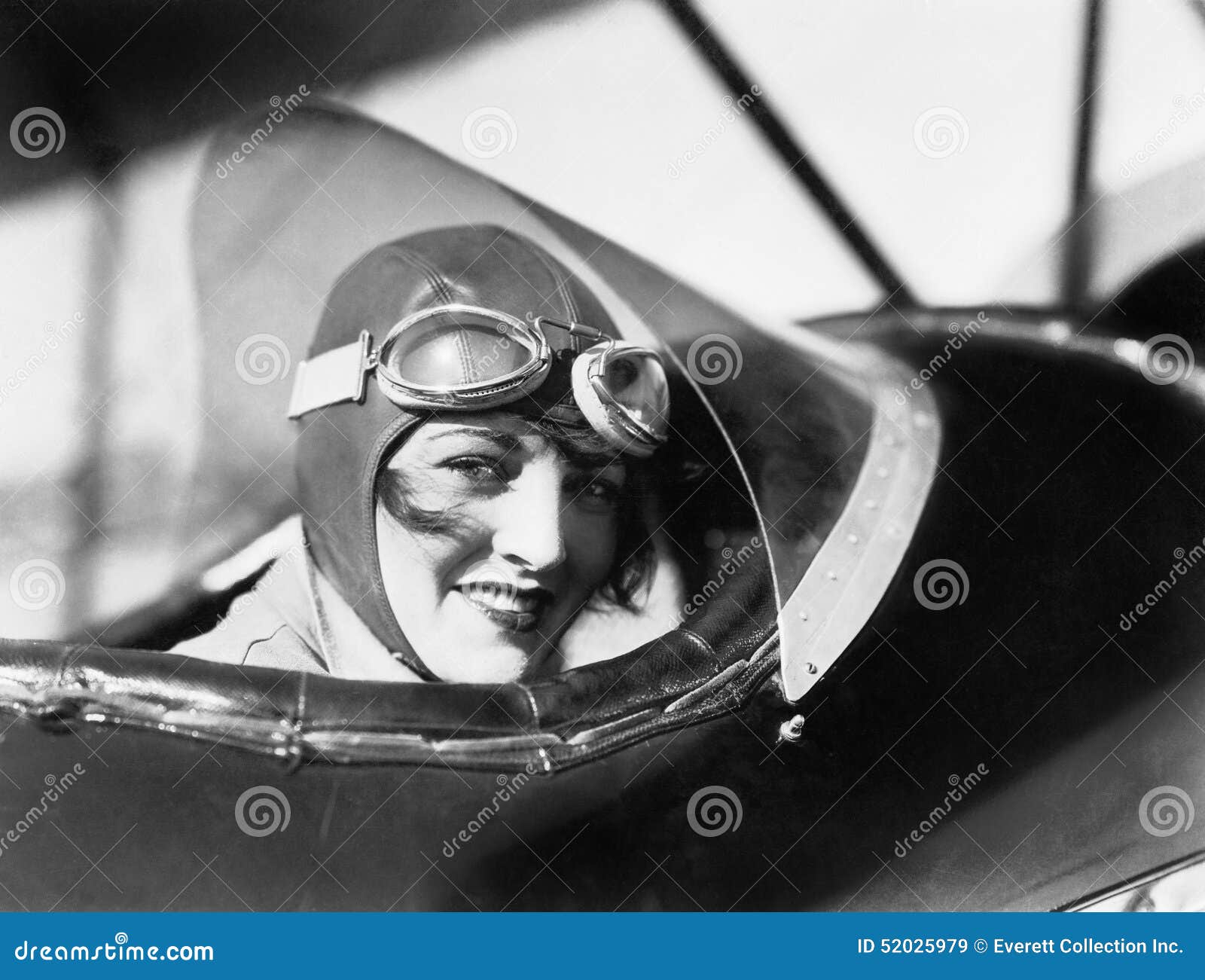 Young Woman Sitting in a Biplane with Hat and Gargles Stock Image ...