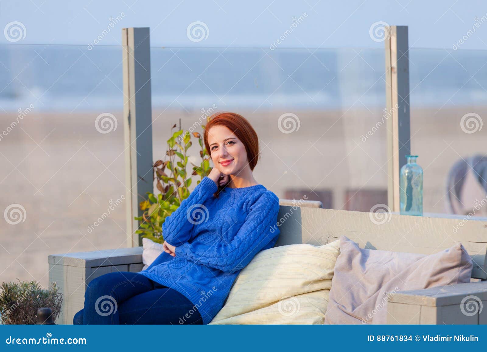 Young Woman Sitting in the Cafe on the Beach Stock Photo - Image of ...