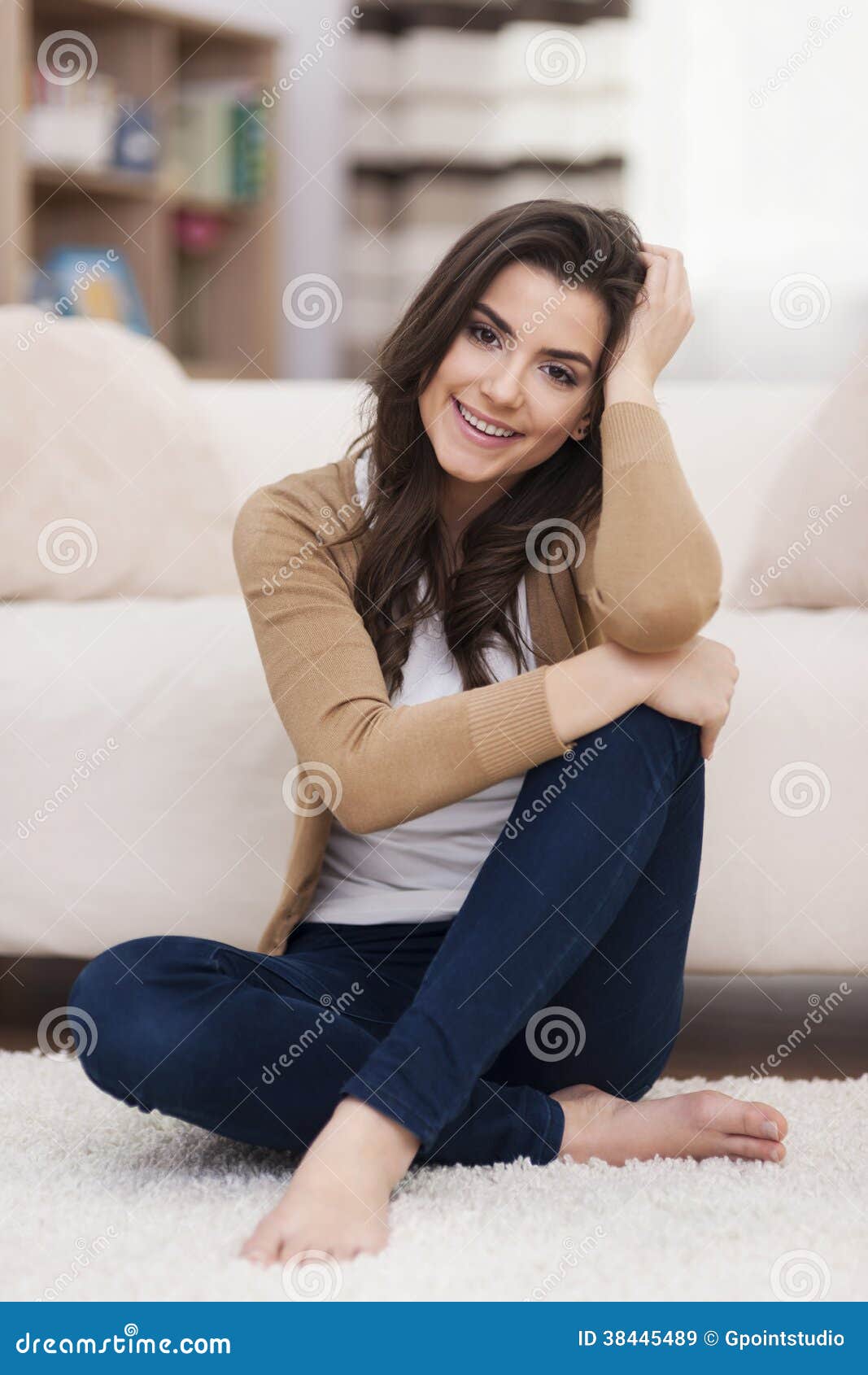 Young Woman Sitting on Carpet Stock Image - Image of camera, carpet ...