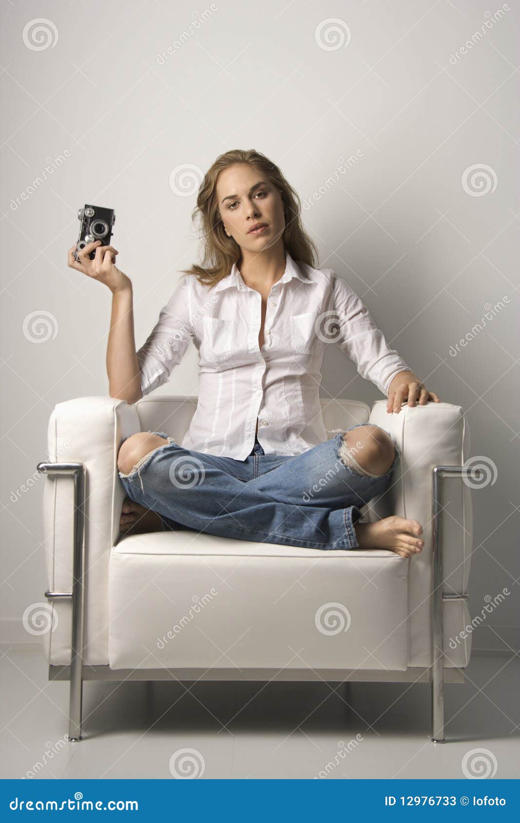 Young Woman Sitting in Chair with Camera Stock Image - Image of ...