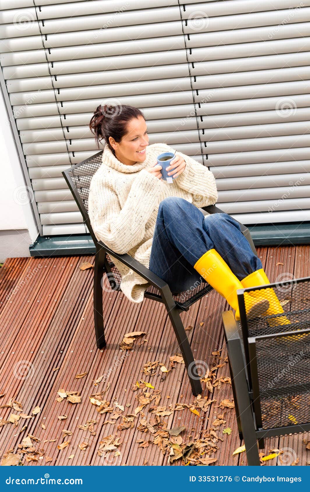 Young Woman Sitting Drinking Tea Fall Patio Stock Photo - Image of ...